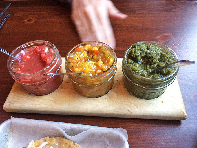 Three amigos of salsa—each jar harboring distinct personalities from mild-mannered tomato to the green one who's not afraid to bring the heat.