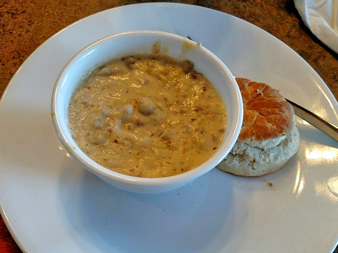 This biscuit swimming in creamy sausage gravy isn't just breakfast&mdash;it's a southern hug on a plate that makes Monday feel like Saturday.