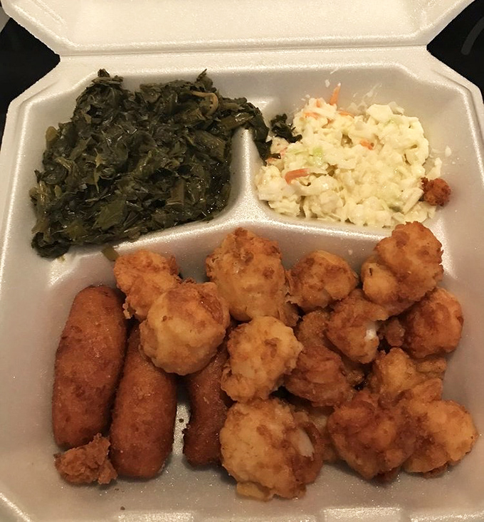 Collard greens, coleslaw, and perfectly fried seafood &ndash; the holy trinity of Southern comfort on a takeout plate.