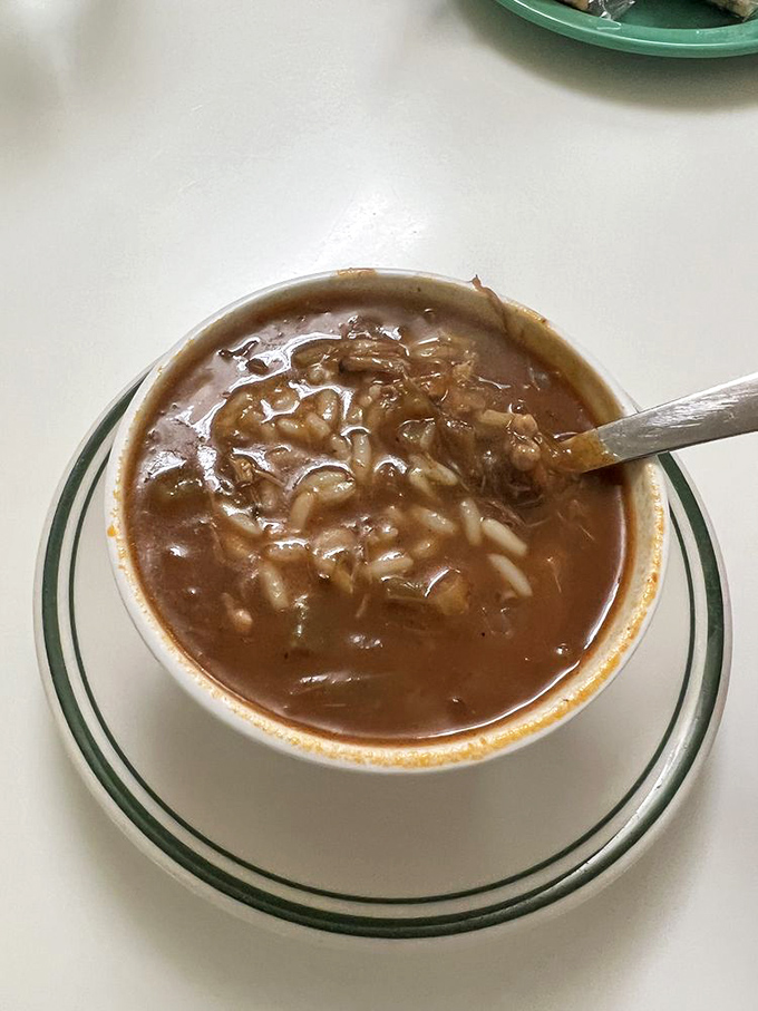 Not all gumbos wear roux. This seafood-packed version swims with the day's catch in a broth that's been perfected over generations.