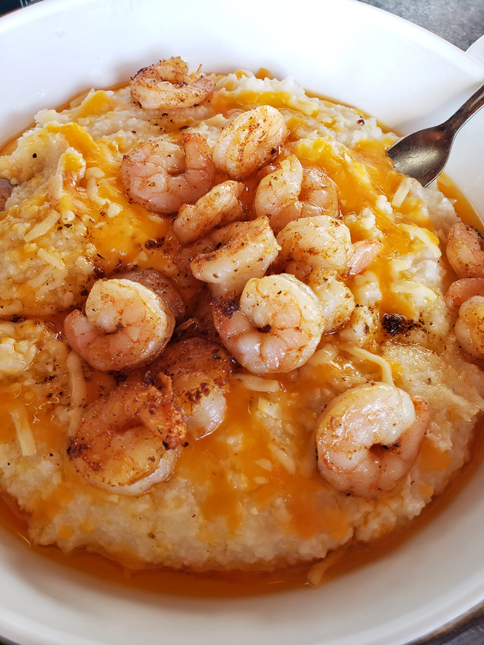 Shrimp and grits: where North meets South in a bowl. Comfort food that makes you want to hug the chef and steal their recipe.