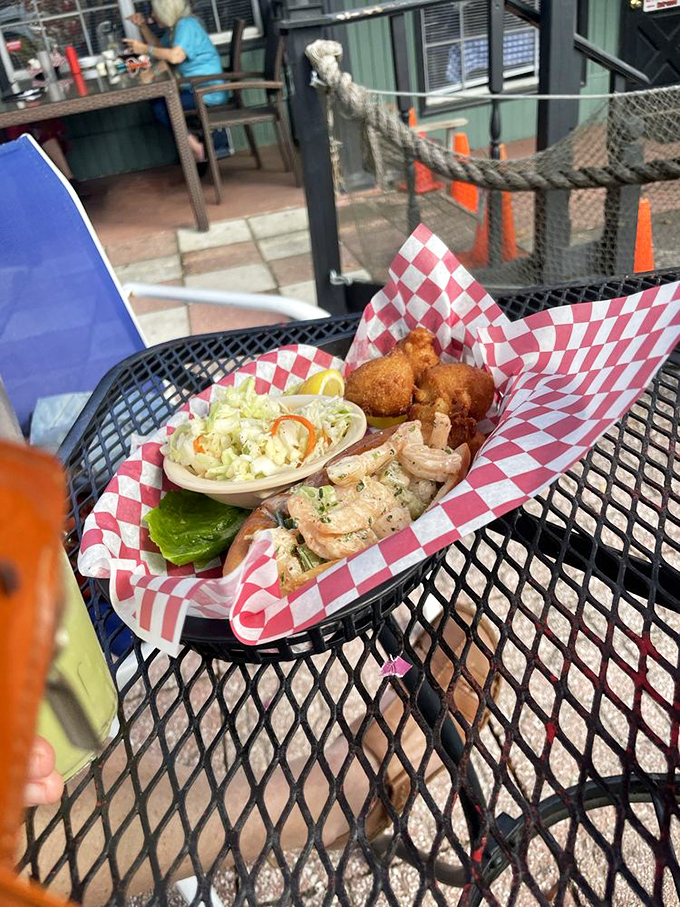 The outdoor dining experience comes with a side of Florida sunshine. Those nautical ropes aren't just for show&mdash;they're keeping the seafood from swimming away!