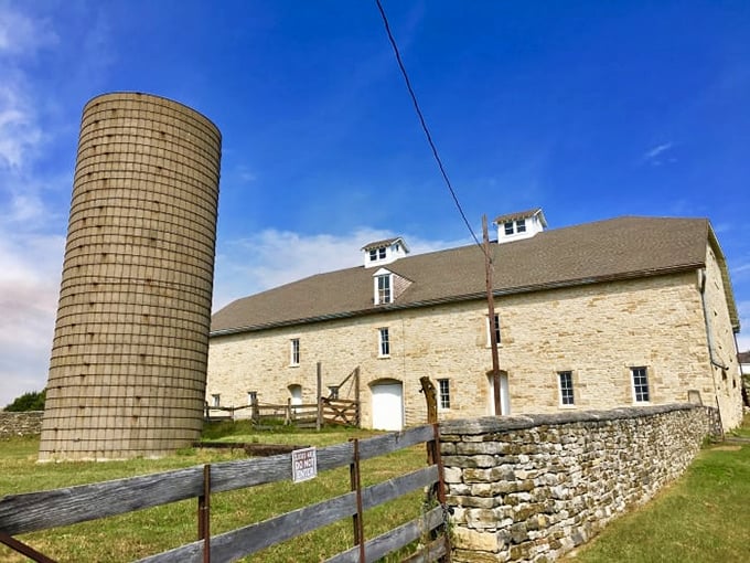 The magnificent limestone barn at Spring Hill Ranch stands as testament to 19th-century craftsmanship and prairie prosperity.