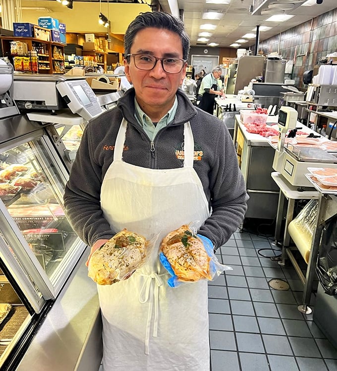 The sandwich maestro at work! Those hands have probably made more perfect lunches than most of us have had hot dinners.