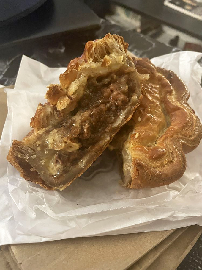 The savory side of pie life! This hand-held masterpiece reveals its beefy interior, flaky pastry giving way to hearty filling&mdash;New Zealand's gift to lunch.