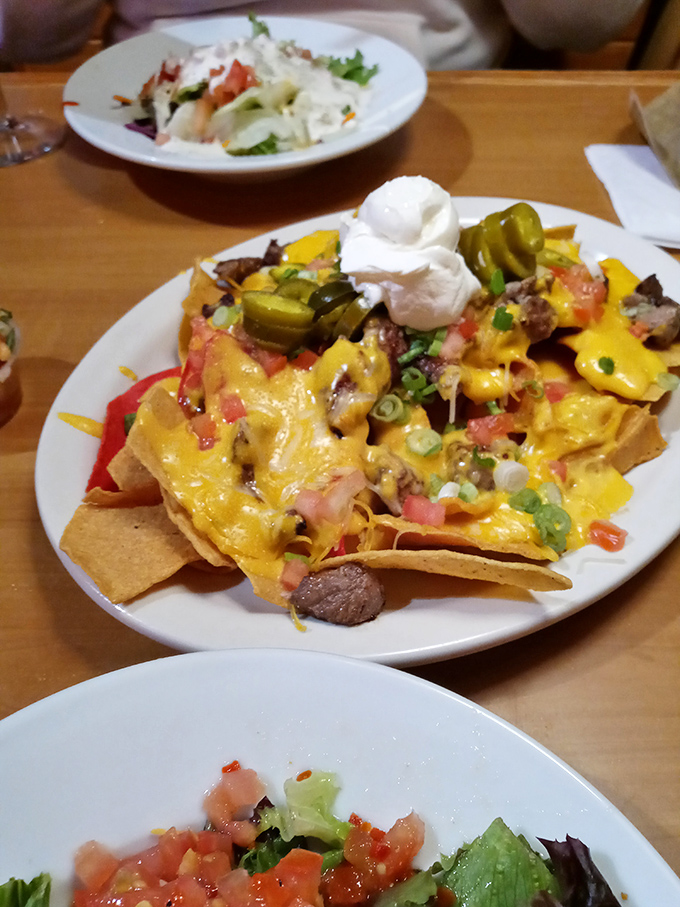 These nachos aren't just topped&mdash;they're architecturally engineered to ensure every chip experiences maximum flavor coverage.