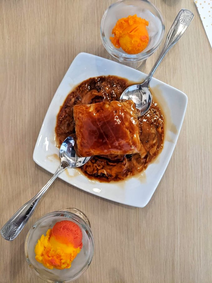 Sticky toffee pudding with ice cream—because after conquering the sea, you deserve a sweet victory lap that would make British grandmothers nod in approval.