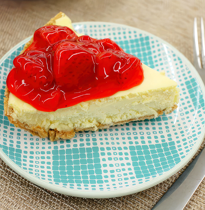 Strawberry cheesecake that makes you wonder why anyone bothers with birthday cake when this creamy dream exists in the world.