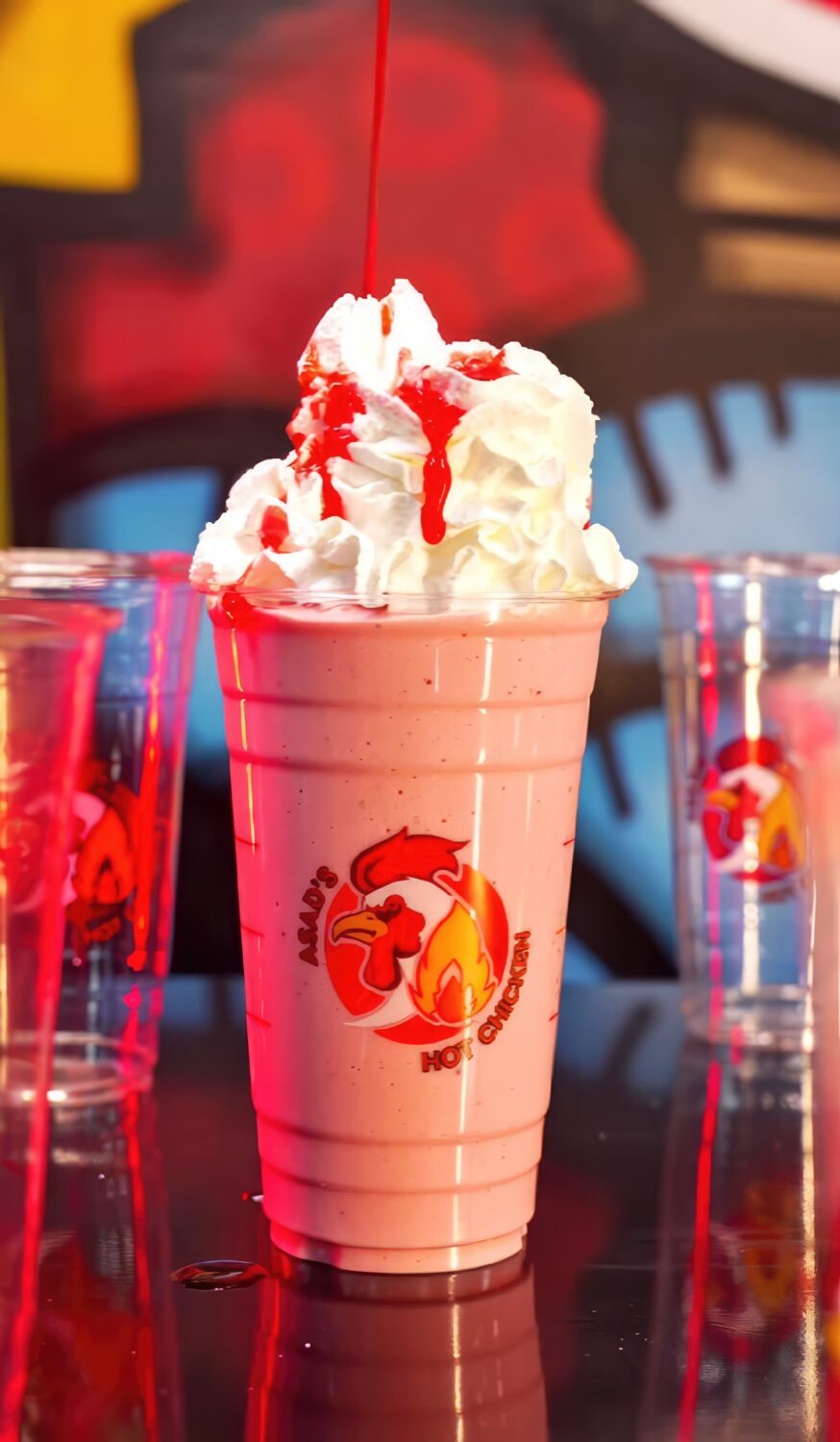 This strawberry milkshake wears whipped cream like a crown. Royalty in a cup, with that red syrup drizzle playing the role of royal jewels.