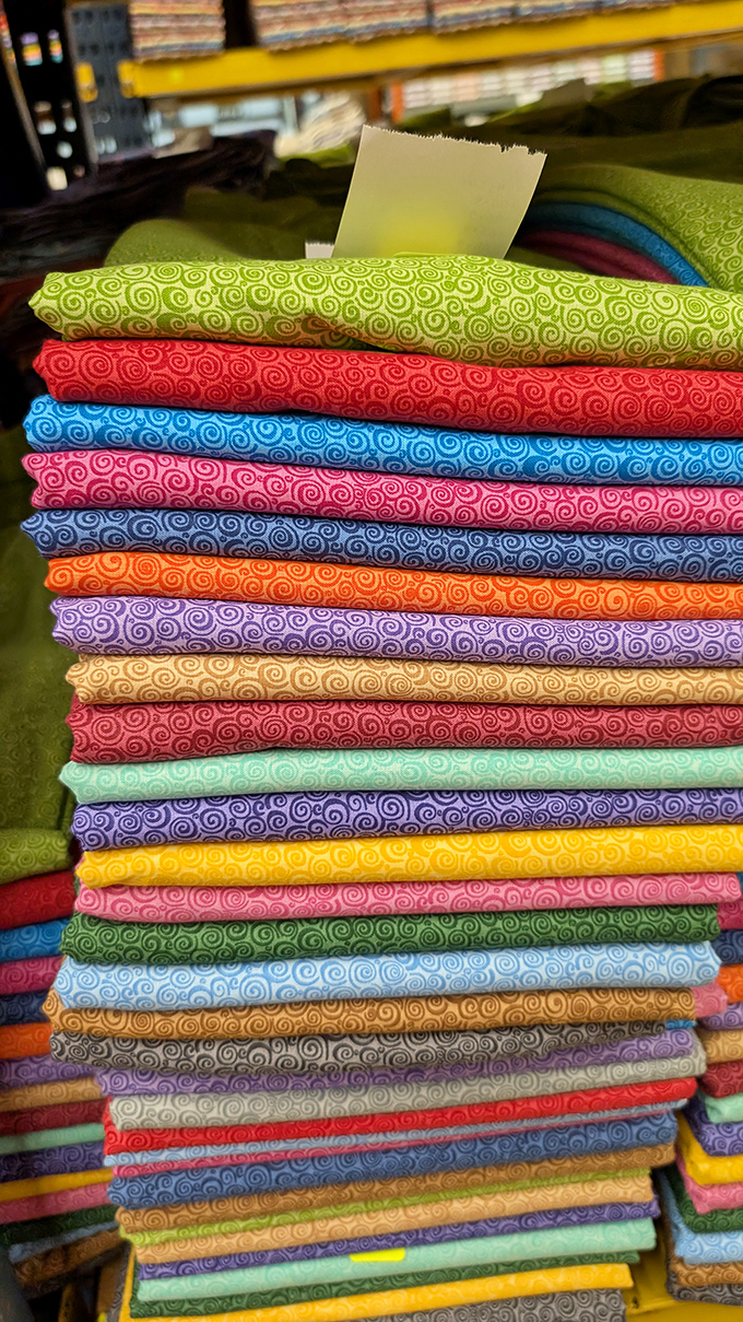These swirled patterns in every color imaginable are hypnotic enough to make you forget you came in for "just one yard."
