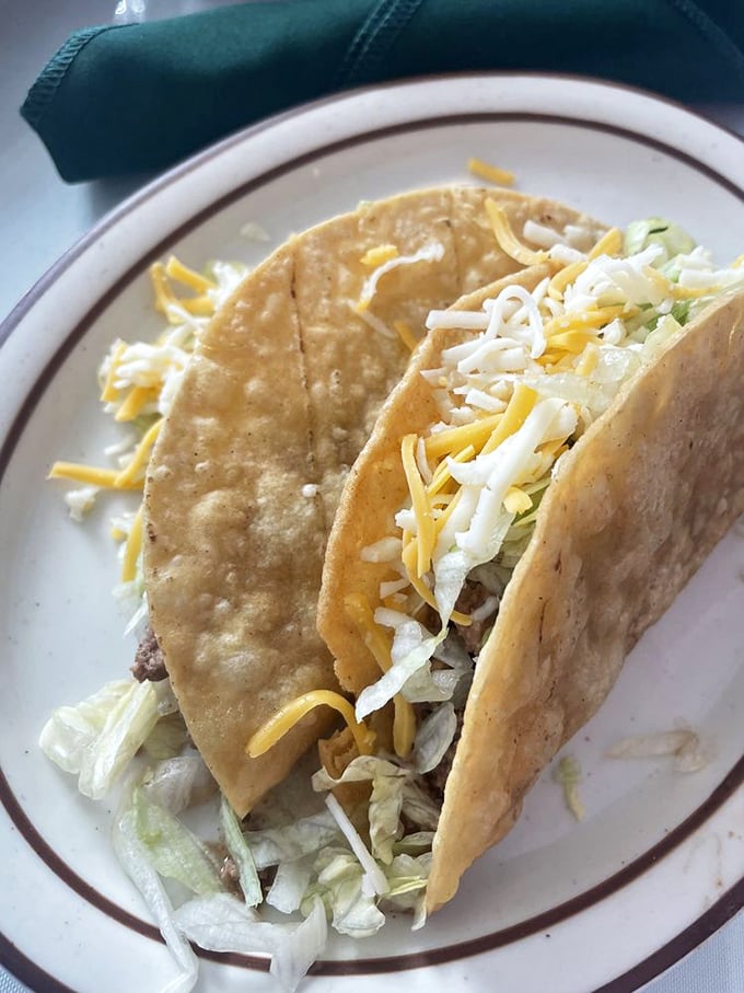 Tacos don't need to wear fancy clothes to impress. These simple beauties with their perfect ratio of meat, cheese, and lettuce speak for themselves.