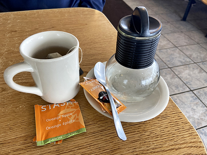 Even tea service gets the thoughtful treatment here—a proper mug, fresh hot water, and a moment of calm before the breakfast storm.