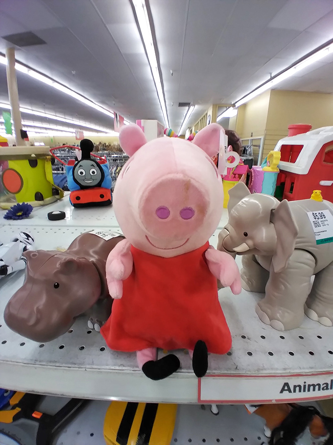 Peppa Pig holds court in the toy section, surrounded by plastic pals waiting for second chances and sticky little fingers.
