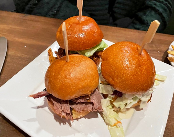 Commitment issues? These sliders understand. A trio of mini-sandwiches lets you experience multiple flavor profiles without the anxiety of choosing just one.