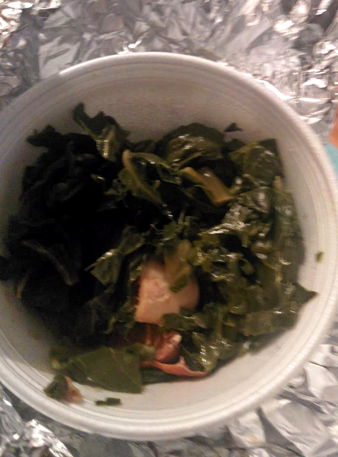 Soul-soothing collard greens with smoked turkey—proof that vegetables can be both virtuous and decadent when treated with proper respect and pork products.