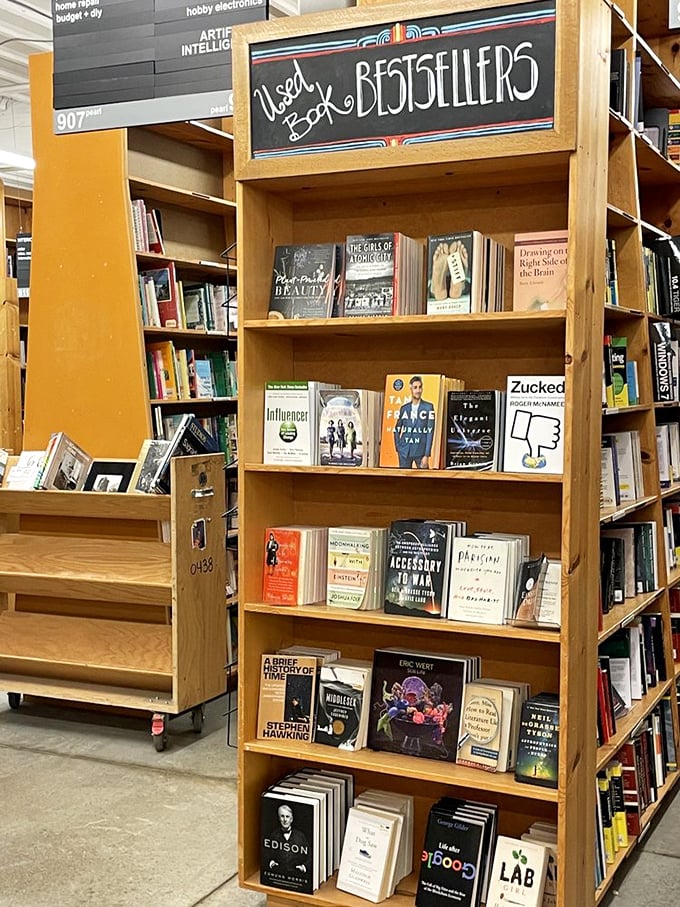 Used bestsellers stand proudly on their shelf, proof that good stories deserve second chances and that someone else's discard might become your new obsession.