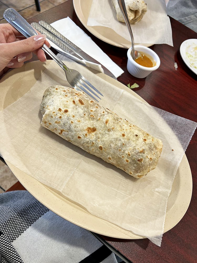 Burritos should be judged like good boxers: by their weight class and technique. This heavyweight champion shows masterful tortilla-wrapping skills.