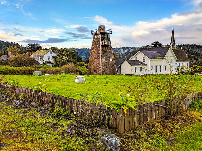 This historic water tower stands sentinel over a meadow bursting with spring blooms&mdash;nature and history having their own little garden party.
