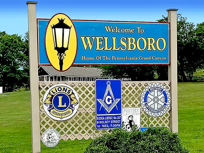 "Home of the Pennsylvania Grand Canyon" proclaims Wellsboro's welcome sign, featuring the town's signature gas lamp that lights the way for visitors.