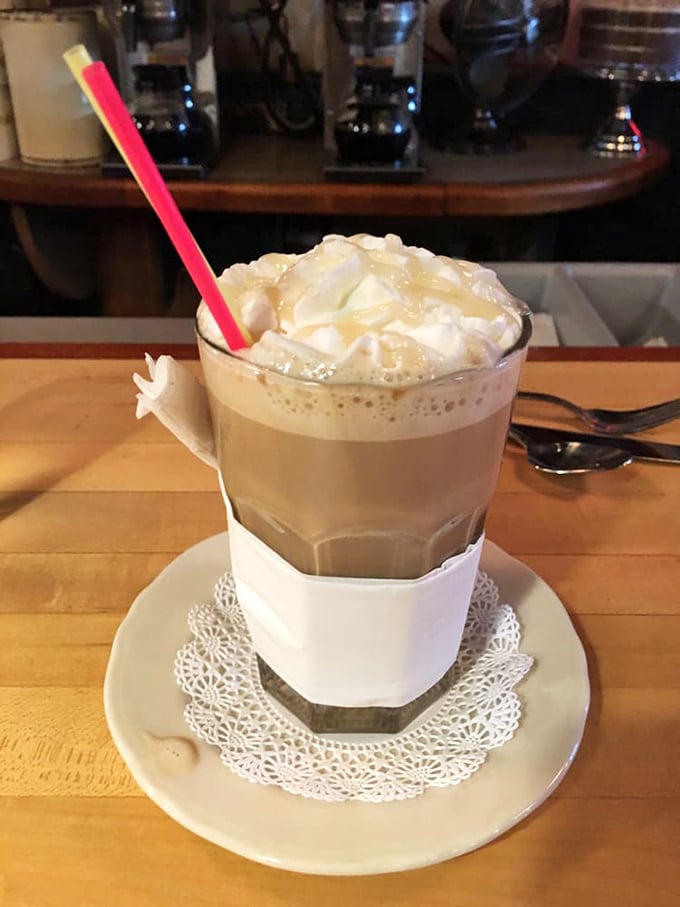 This isn't just coffee&mdash;it's a frothy white chocolate mocha served on a doily, because even caffeine deserves to dress up sometimes.
