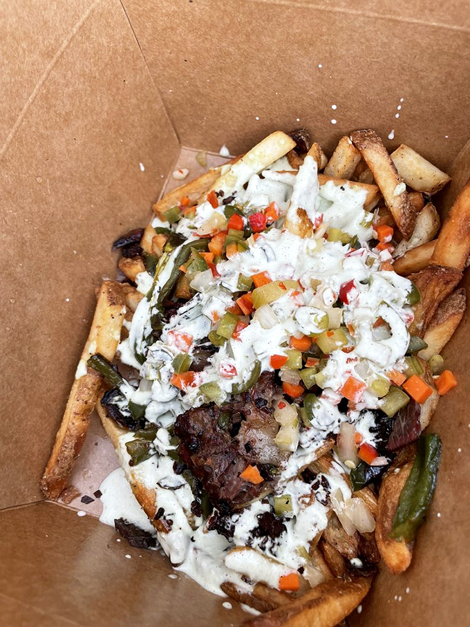 Zombie Fries: where potatoes go to heaven, then return with giardiniera, meat, and sauce. They'll haunt your dreams in the best way.