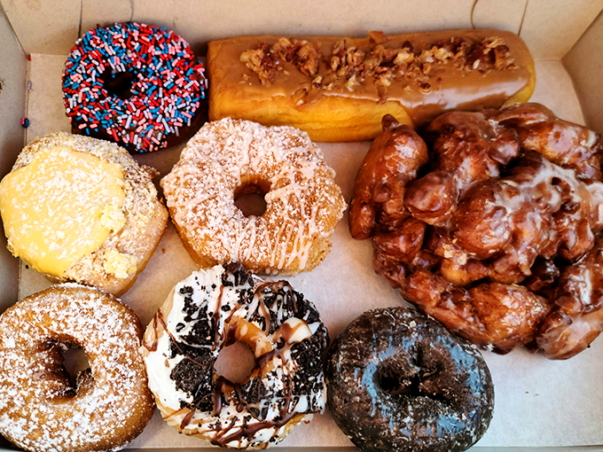 The assorted box &ndash; a United Nations of donuts where chocolate, sprinkles, and glazed varieties negotiate delicious diplomacy.