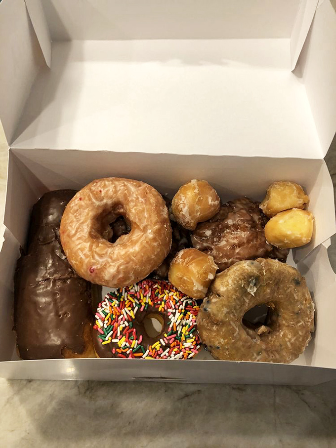 The donut box &ndash; a cardboard treasure chest containing a perfectly curated selection of fried dough jewels worth more than gold.