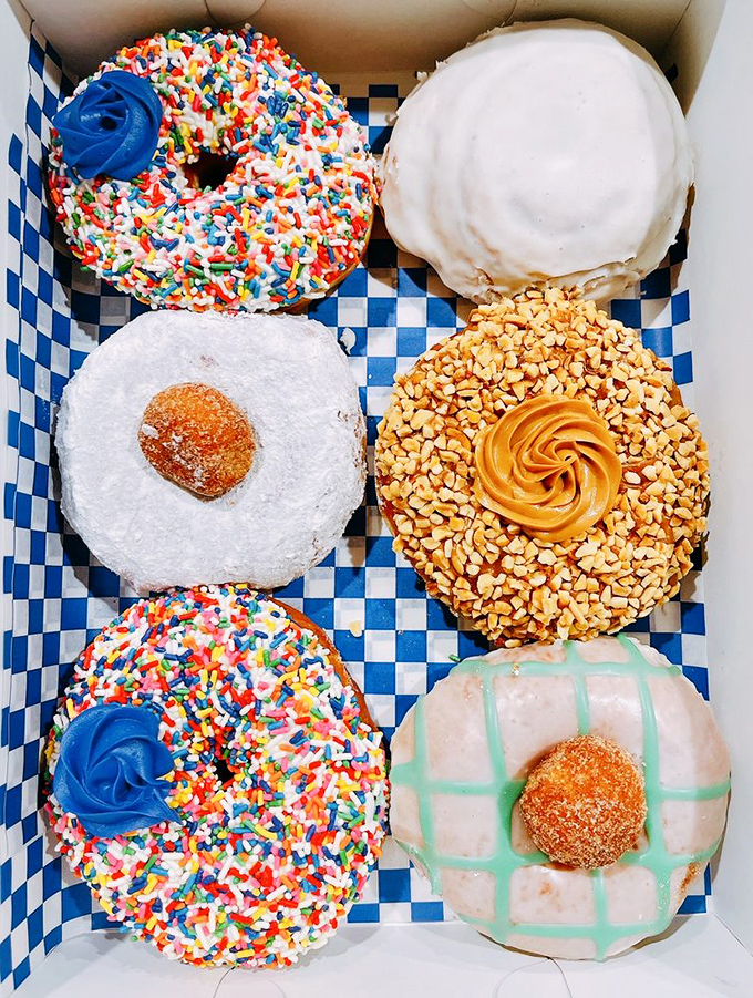 A box of DG doughnuts is like a color wheel of happiness. The hardest decision you'll make today is which one to eat first.