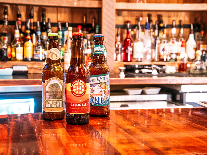 Local craft brews line the bar, offering liquid proof that North Carolina knows its way around both beef and beer.