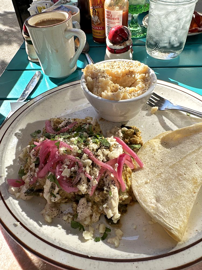 When your breakfast looks like it's wearing a party hat of pickled vegetables and fresh herbs, you know you're in good hands.