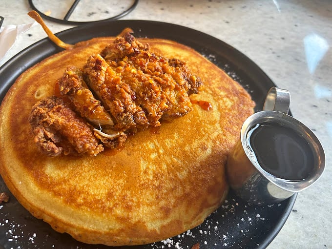 
This chicken-topped pancake isn't just breakfast&mdash;it's breakfast that's living its best life, with maple syrup standing by for the perfect sweet-savory marriage.