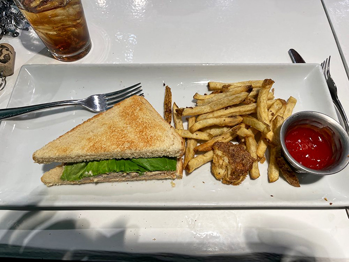 A sandwich that understands balance&mdash;toasty bread, melty cheese, and a garden-fresh salad that doesn't feel like punishment.