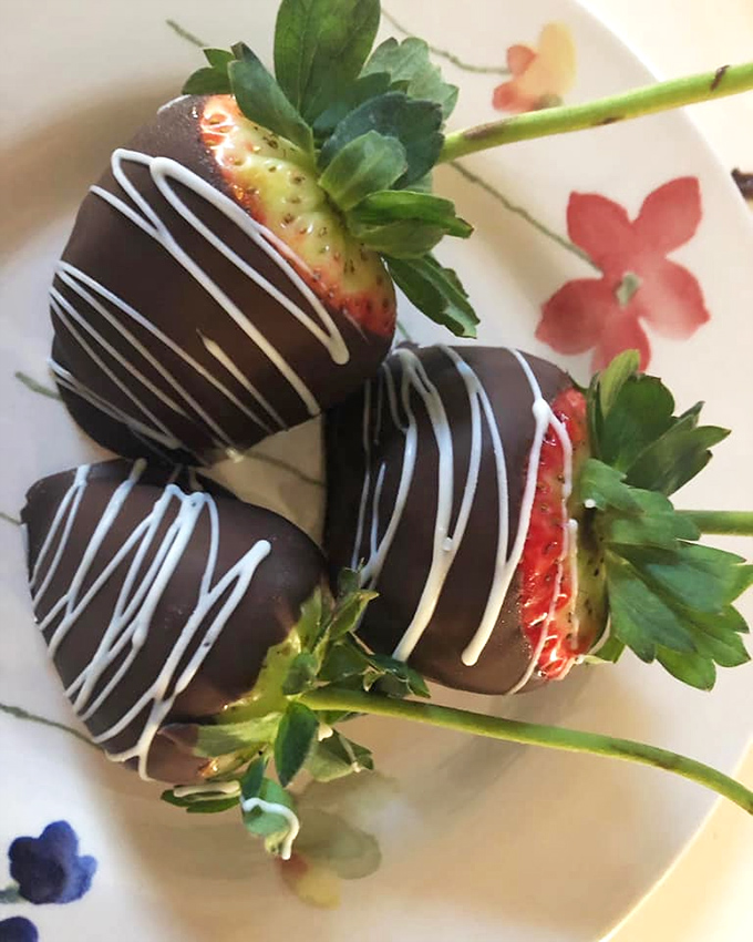 Chocolate-dipped strawberries that belong in the Louvre. Somehow both rustic and elegant, like a country singer at the Met Gala.