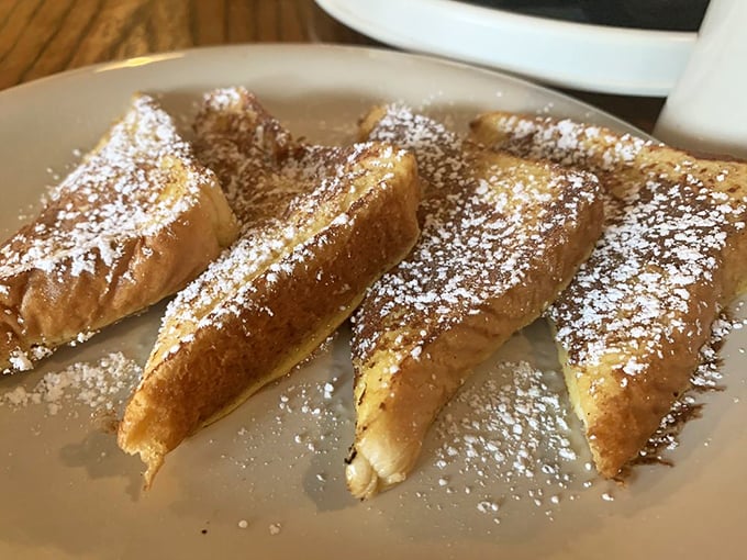 French toast that whispers, "Take your time with me." That dusting of powdered sugar isn't just decoration&mdash;it's a commitment to excellence.
