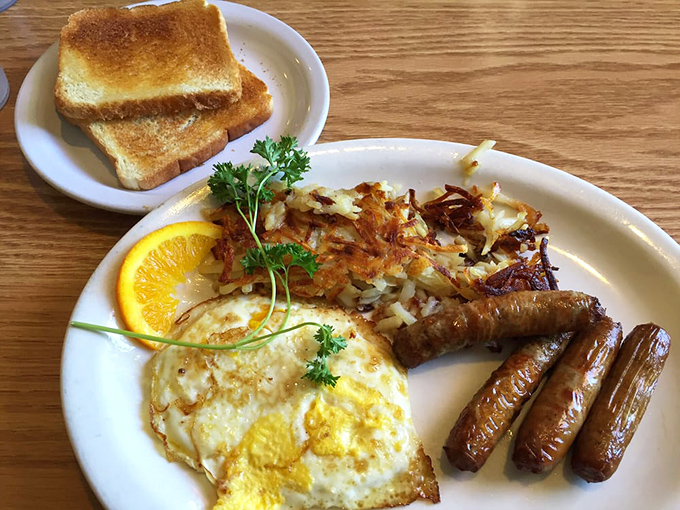 Breakfast fundamentals executed with military precision. Those hash browns have achieved the perfect crisp-to-tender ratio that scientists still can't explain.