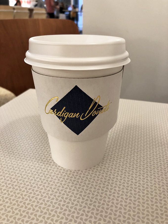 Even the coffee cups get the Cardigan treatment. That elegant logo says, "Yes, this is a serious coffee establishment that also happens to make incredible donuts."