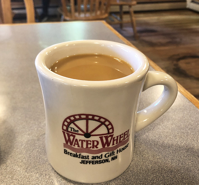 Their coffee comes in mugs substantial enough to warm both hands on a chilly New Hampshire morning. The logo reminds you you're somewhere special.