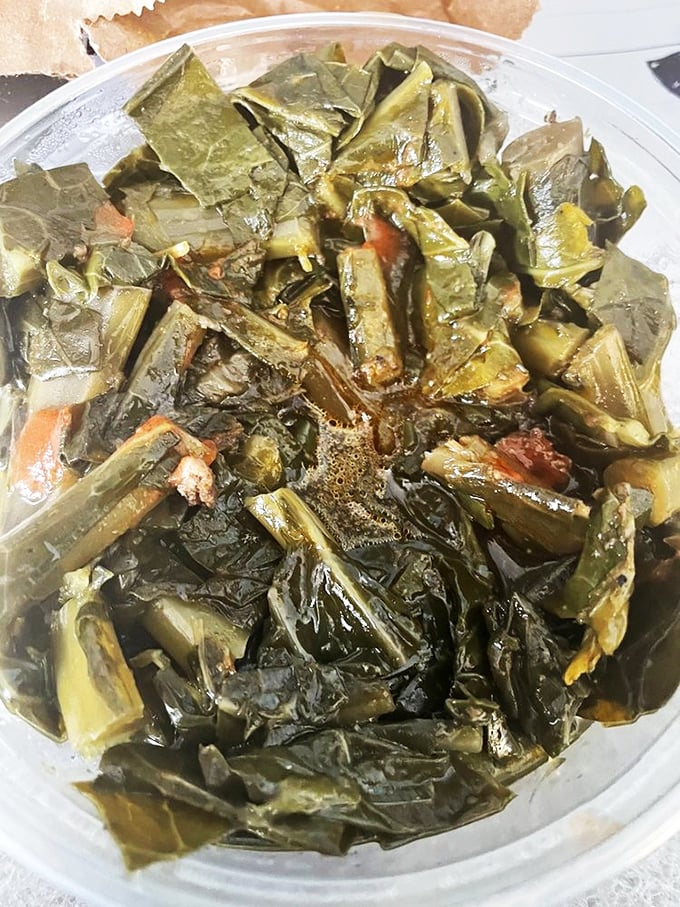 Collard greens swimming in pot liquor with black-eyed peas nearby&mdash;proof that side dishes aren't just supporting actors but sometimes steal the whole show.