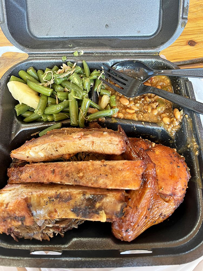 A barbecue United Nations where different meats gather peacefully alongside mac and cheese and greens—diplomacy never tasted so good.