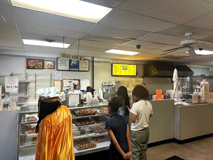 Customers line up at the counter, participating in a Chicago ritual as time-honored as complaining about winter or defending deep dish.
