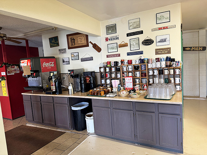 The coffee station isn't just serving caffeine; it's dispensing liquid optimism with a side of nostalgia. Those vintage signs speak breakfast truth.