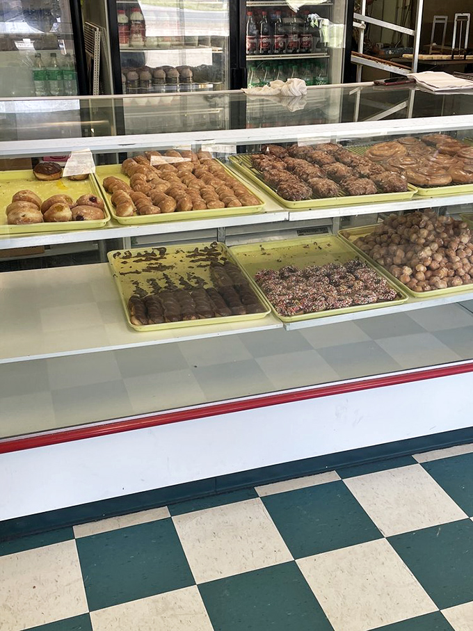 Behind this humble counter, dreams are boxed up twelve at a time, sending hundreds of Louisianans into sugar-induced bliss daily.