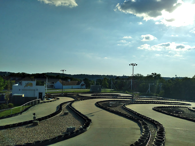 A bird's-eye view reveals the serpentine challenge ahead—a concrete canvas where split-second decisions separate champions from also-rans.