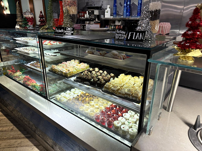 A dessert display that whispers sweet nothings to your willpower. Resistance is futile when faced with this many tiny, perfect confections.