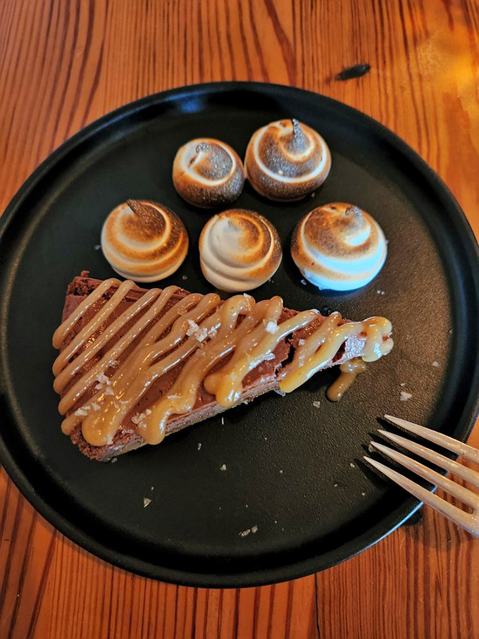 Dessert at Heirloom demonstrates that even sweets deserve the artistic treatment. Those toasted meringue domes flanking caramel-drizzled perfection prove that Delaware knows how to end a meal.