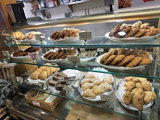 The dessert case that launched a thousand diet exceptions. When pastries look this good, calories are just numbers that don't apply on vacation.