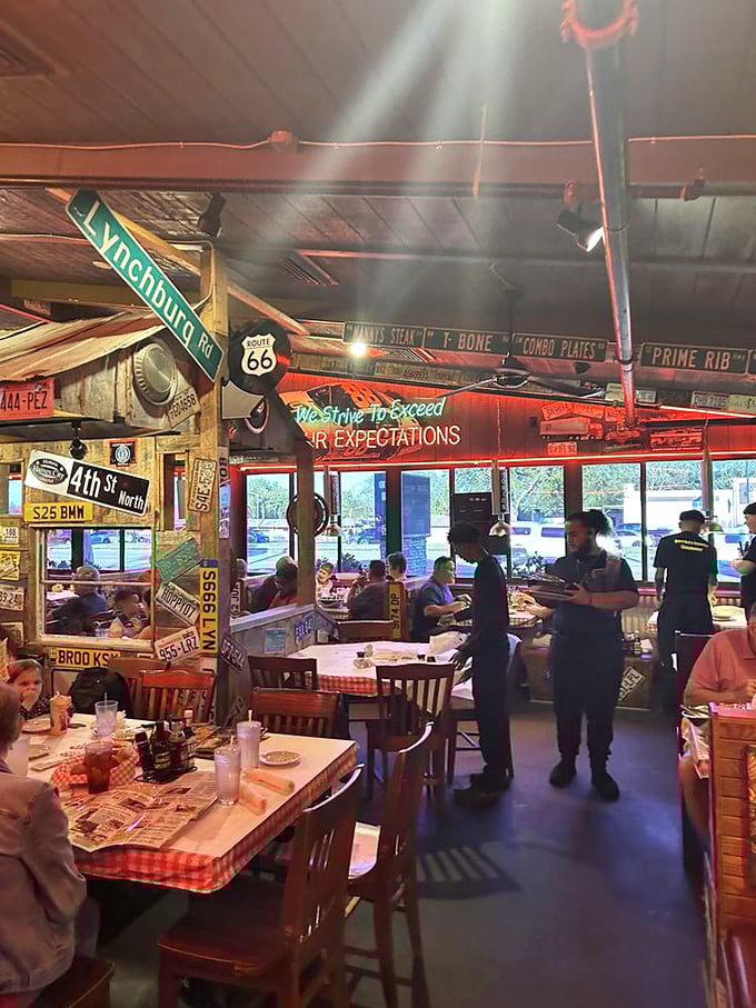 The bustling dining room combines street signs, hungry patrons, and attentive staff—proof that organized chaos can be deliciously comforting.