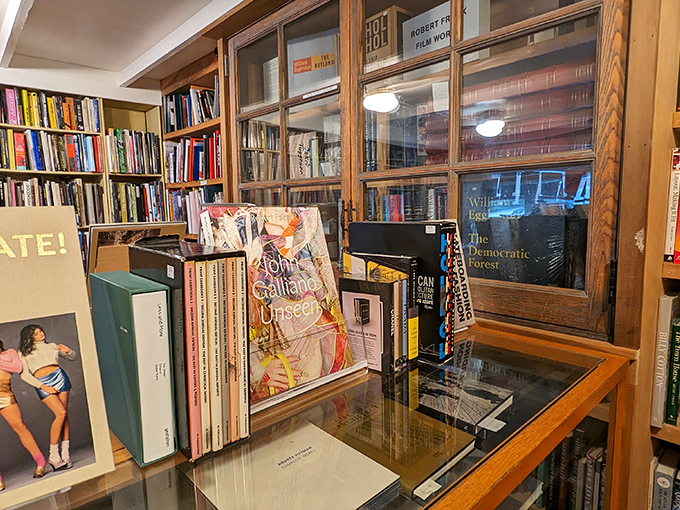 Behind glass doors, literary treasures await the discerning collector—each spine telling stories before you've even cracked open a cover.