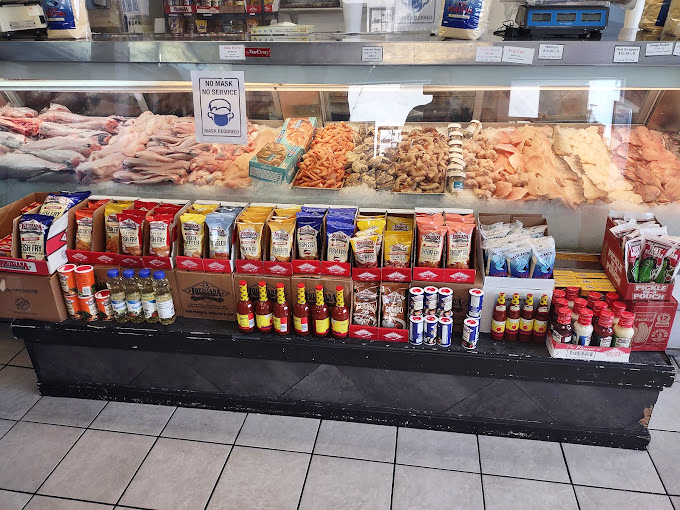 The seafood case rivals any coastal market, a mirage of oceanic delights that somehow materialized in landlocked Kansas City.