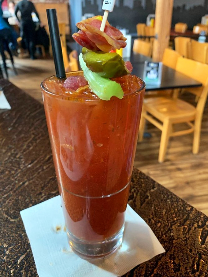 The Bloody Mary here doesn't just come with garnishes &ndash; it arrives with an entire appetizer balanced on top. Drinking and eating efficiency at its finest.